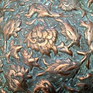 An Antique Indian Copper Wall Hanging Plate Profusely Decorated With a ...