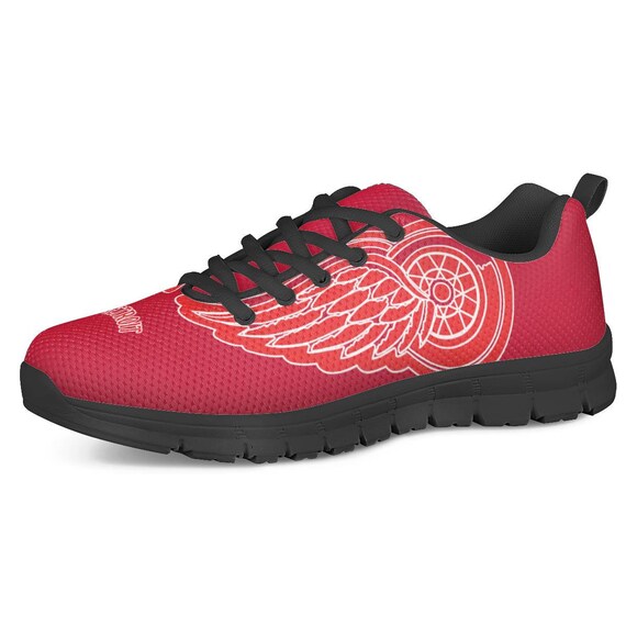 Pink Running Shoe With Wings