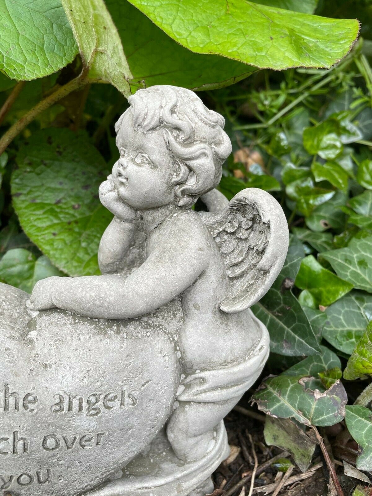 Cherub w heart stone statue reconstituted angel nymph | Etsy