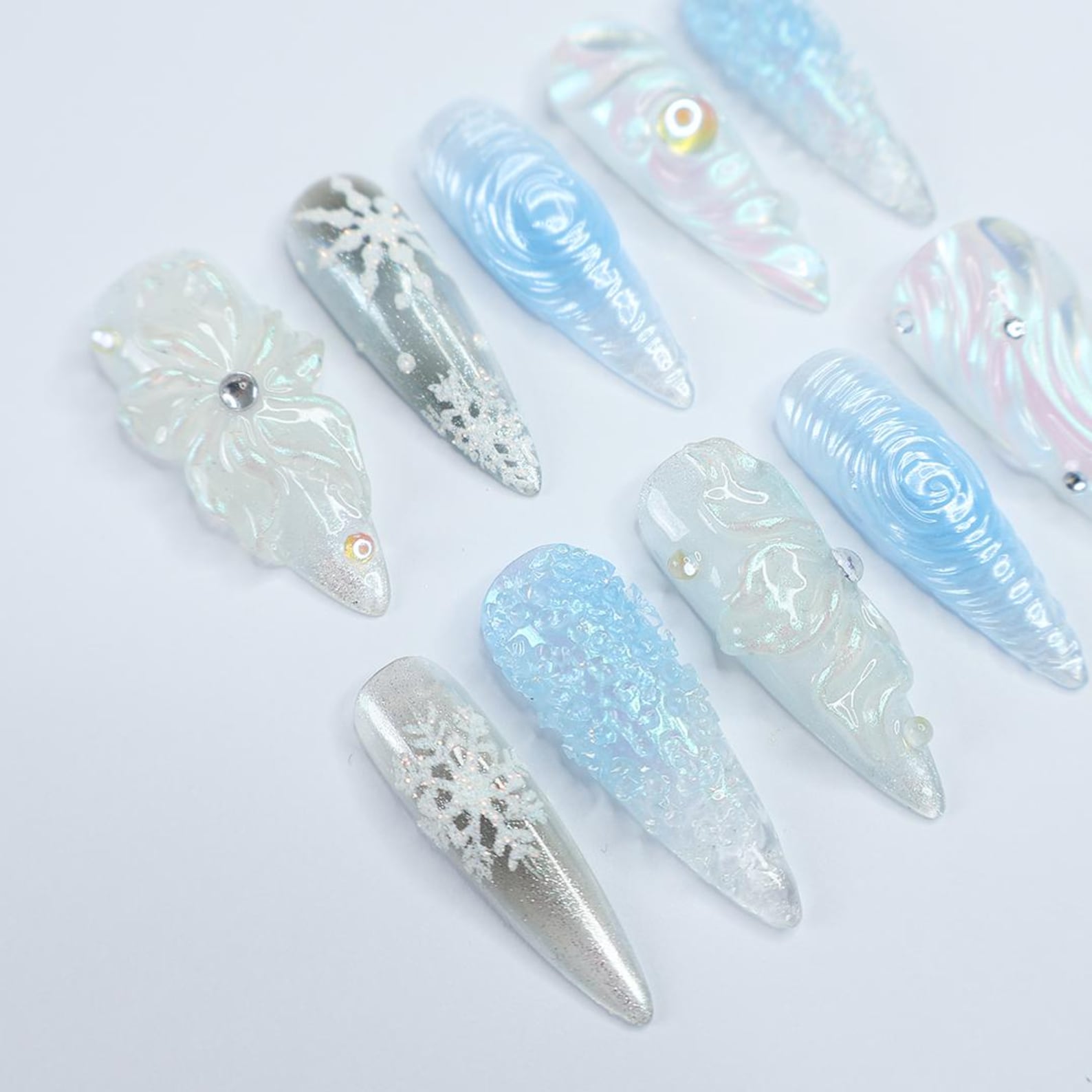 Chilly Elegance: Long Almond Press-on Nails Adorned With 3D Flowers ...