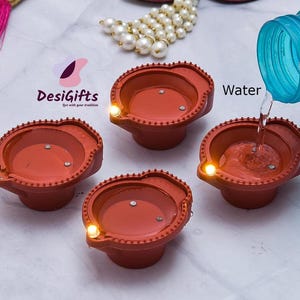 Water Sensing Diya, Battery Diya, Clay Look a Like Water Sensor Diya ...