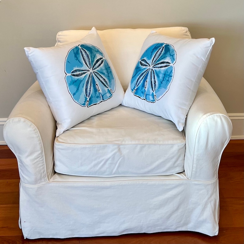 Hand-drawn Sand Dollar Design on Soft White Pillow - Elegant Coastal ...