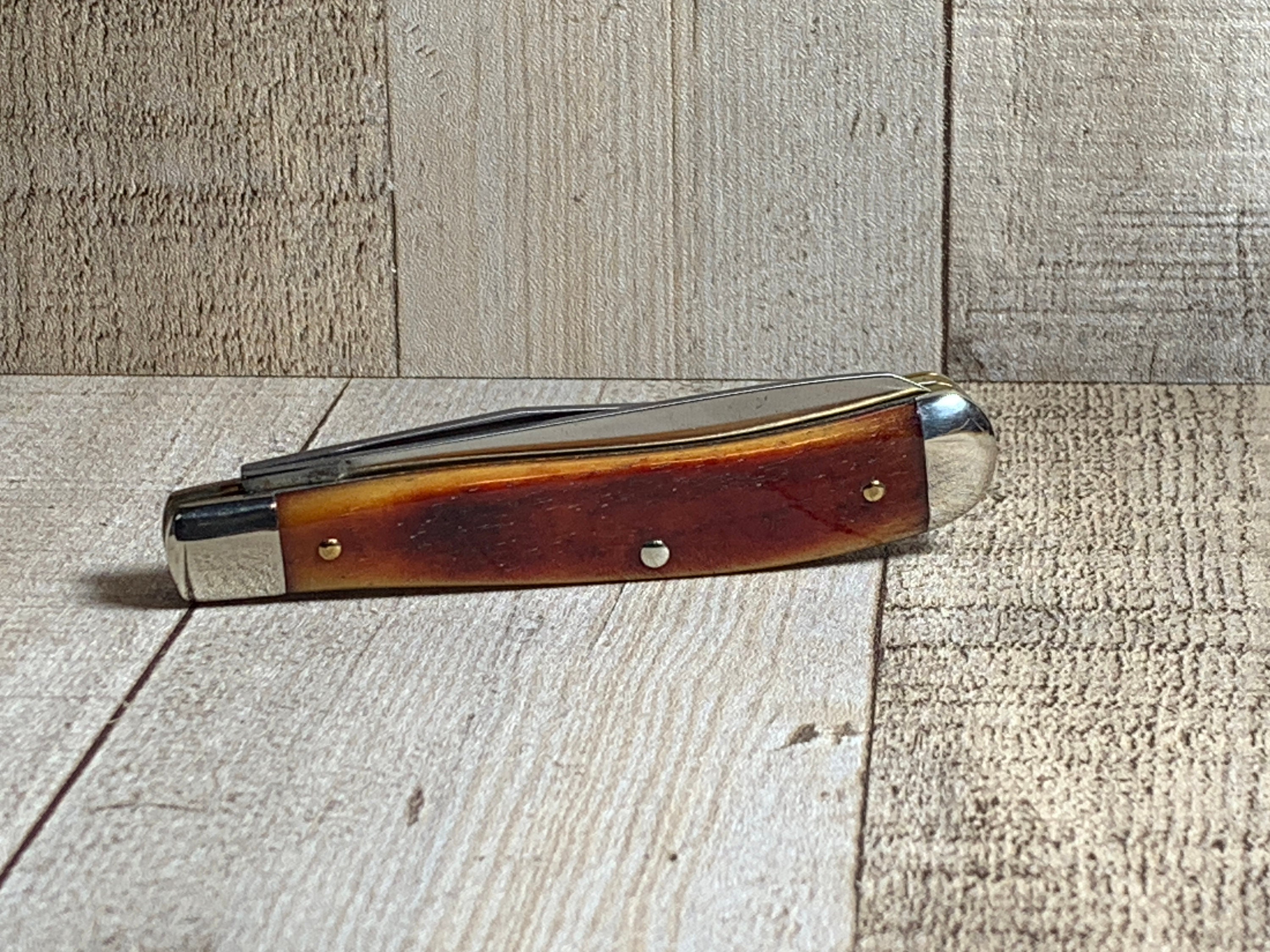 Schrade 94OT Gunstock Trapper Knife With Smooth Amber Colored Bone ...
