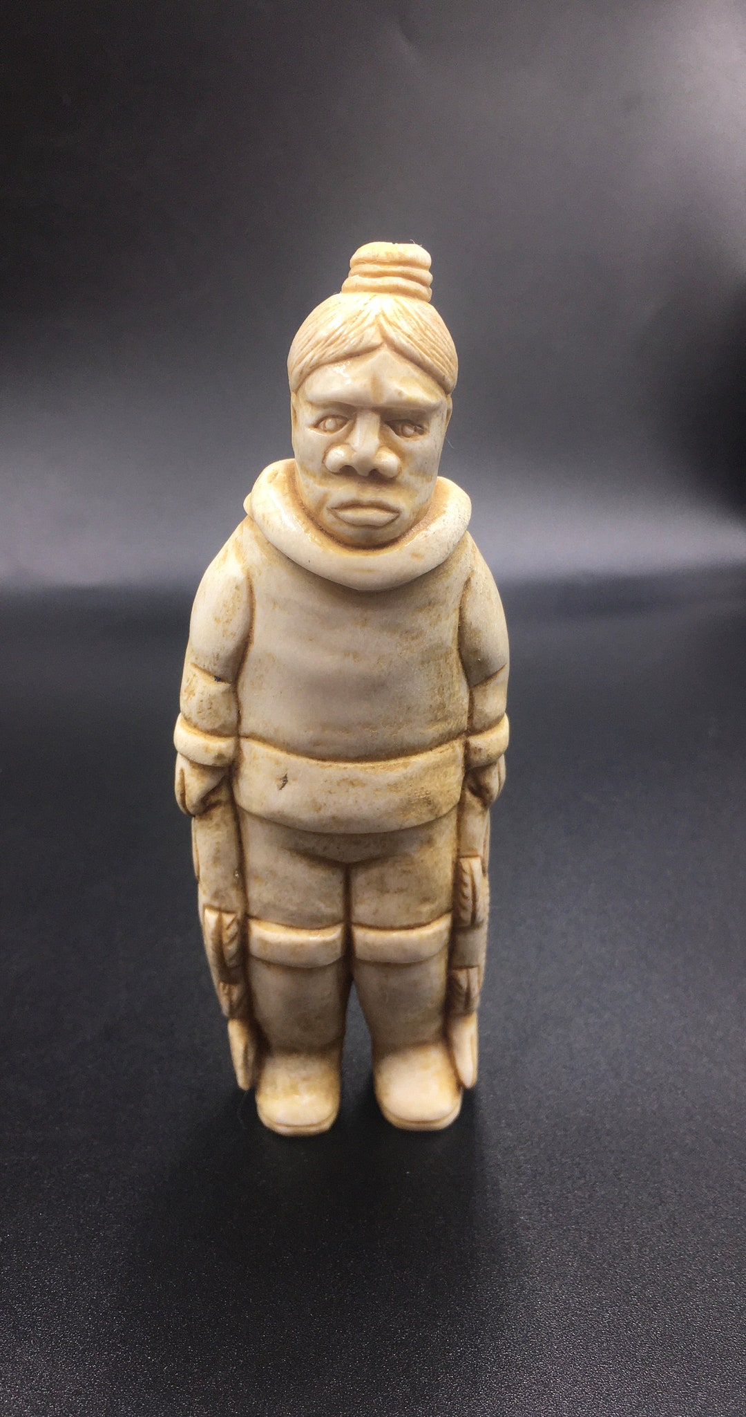 Collectible Inuit Figurine: Rustic Sculpture Depicting Fisher Man ...
