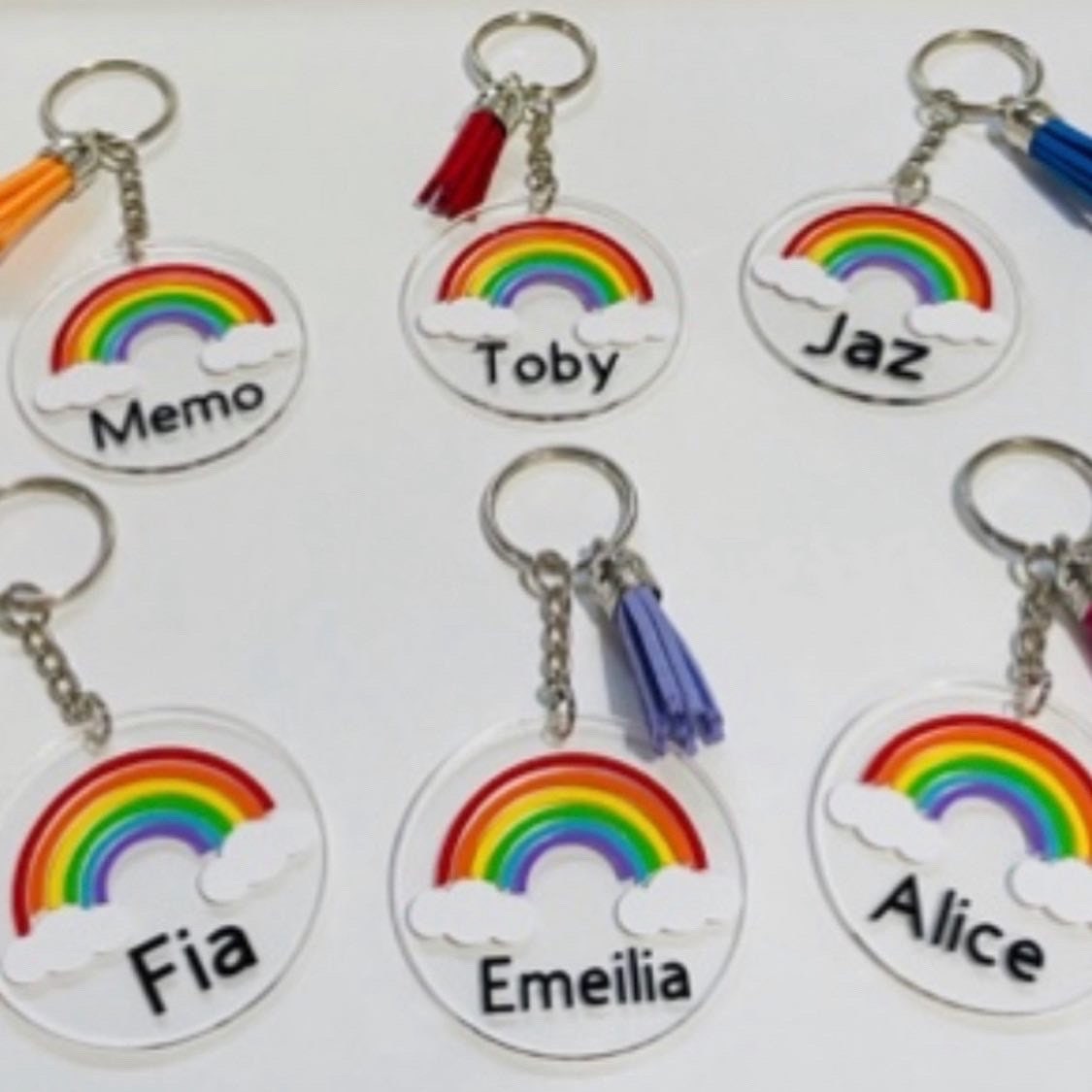 Llaveros arcoiris personalizados // relleno de calcetín - Etsy España