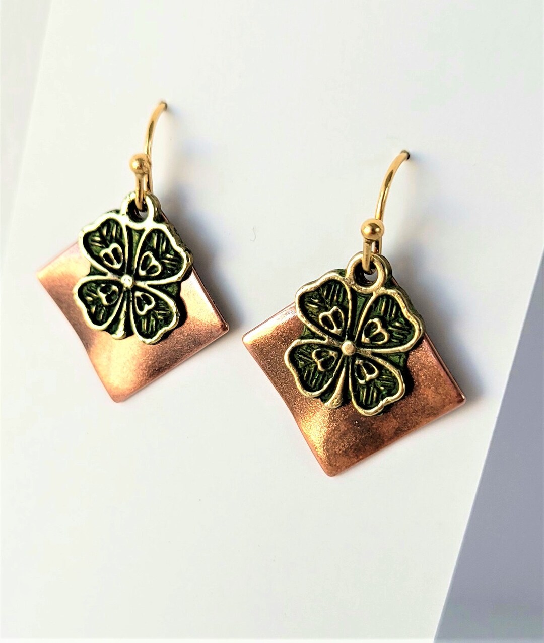 Gold Embossed Green Four Leaf Clover on Copper Diamond Disc Dangle ...