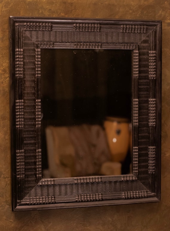 17th century Dutch style ripple molded frame.