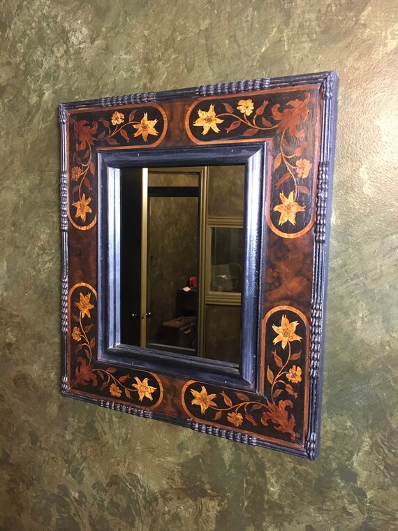 Hand crafted 17th century Dutch style ripple molded and marquetry frame.