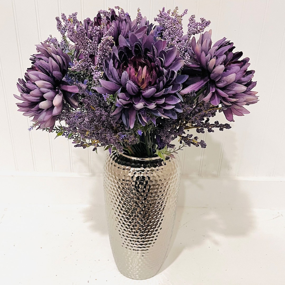 A Deep Purple Floral Arrangement. the Vase is Filled With Purple ...