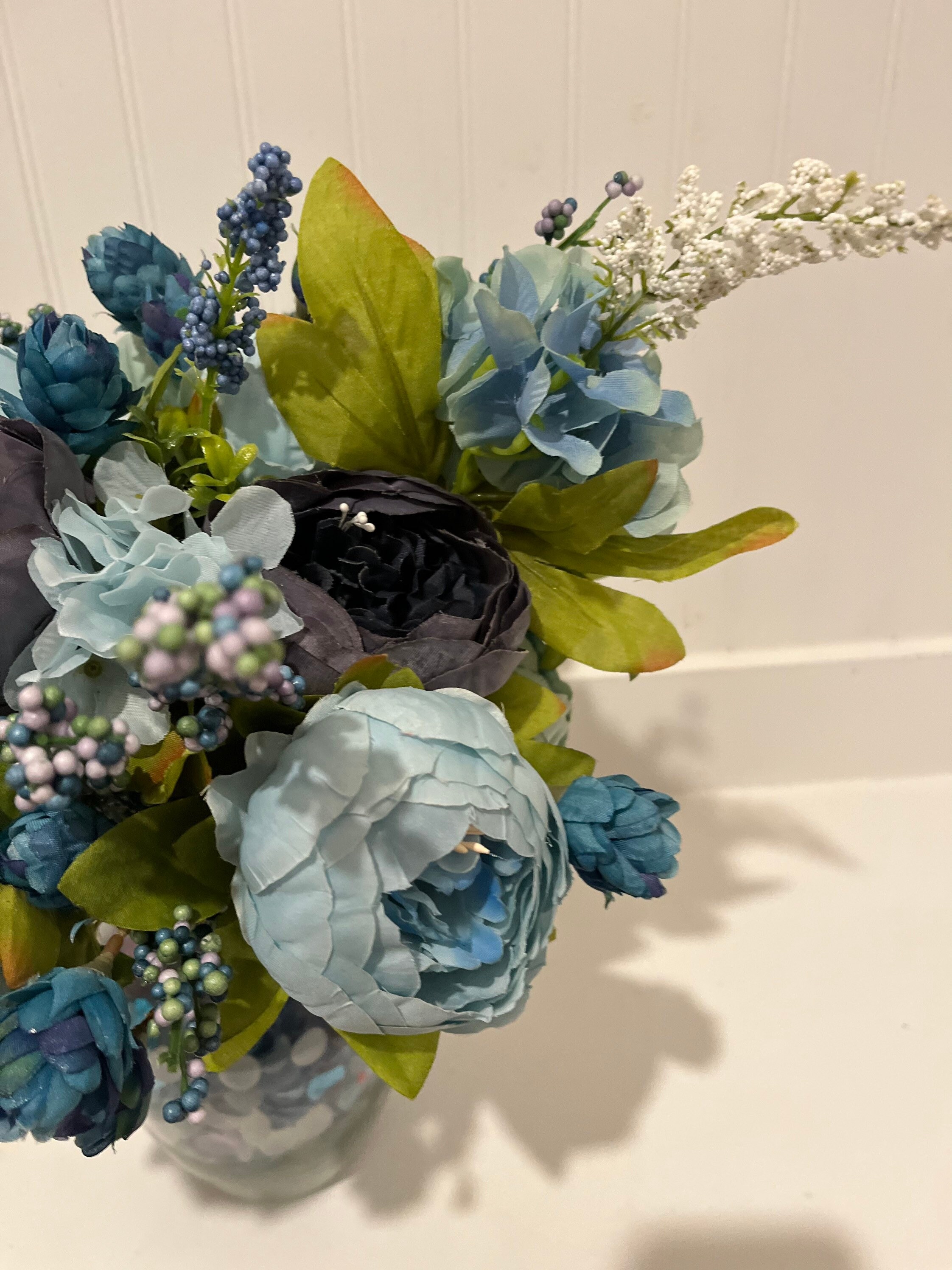 Beautiful Shades of Blue Flowers in a Clear Glass Vase, Filled With ...