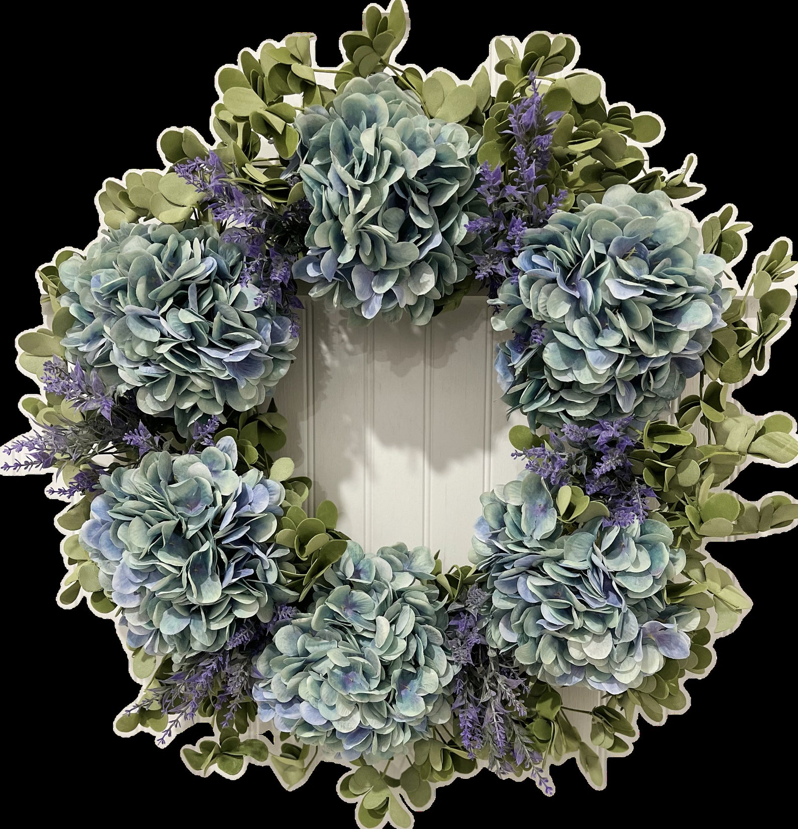 A Beautiful Blue Hydrangea Wreath With Sprigs of Lavender is Made on a ...