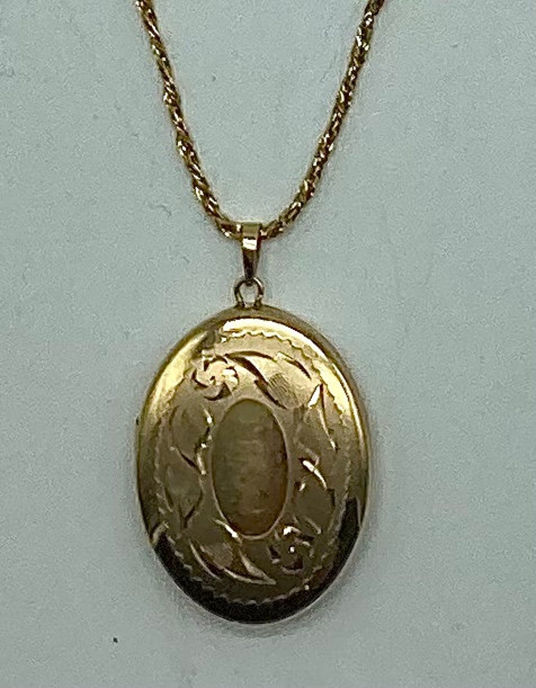 14 Karat Gold Oval Shaped Locket Necklace With 24 Inch Long 14 Karat ...