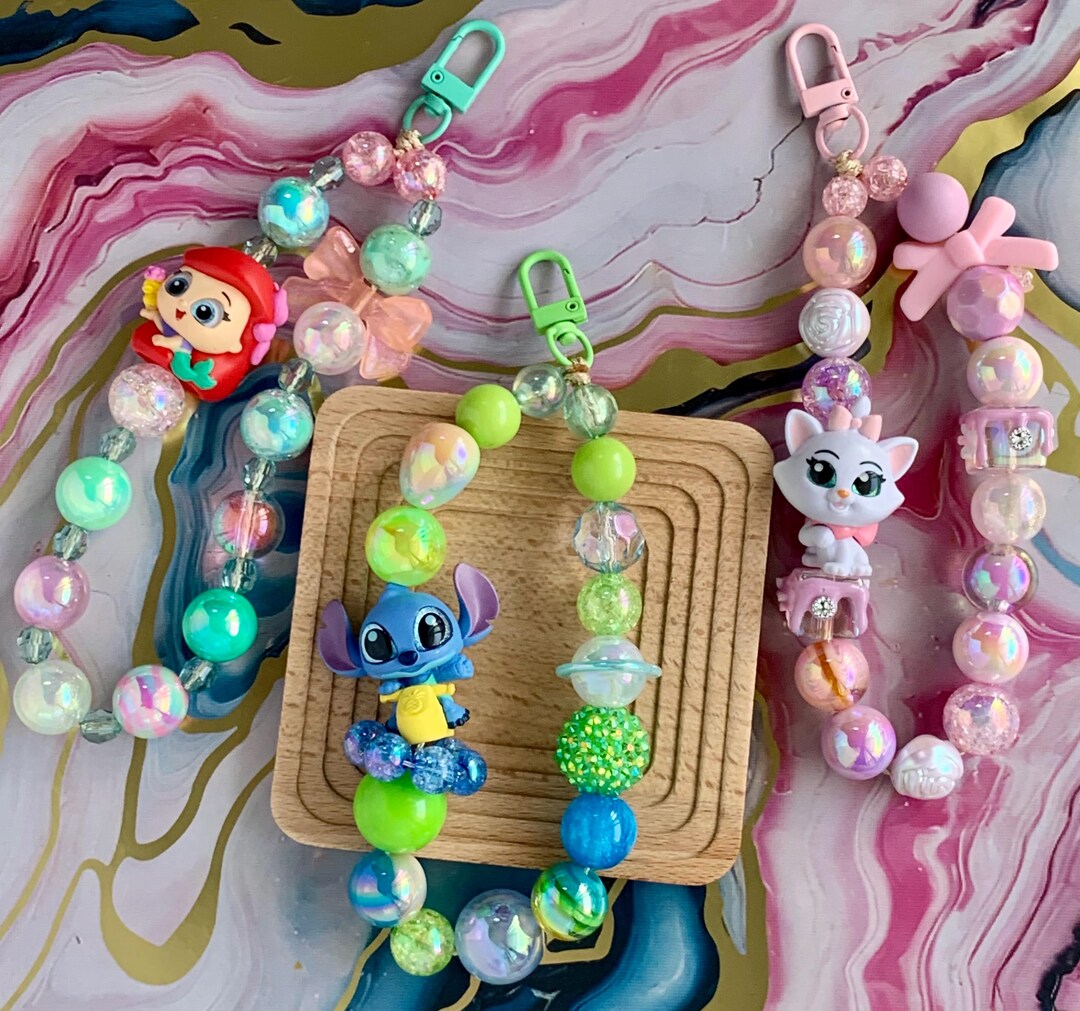 Doorable Stitch on Scooter, Marie Aristocats, Ariel Little Mermaid ...