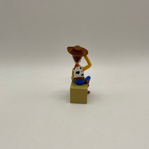 Disney Toy Story Woody Sitting on Block Figurine - Etsy
