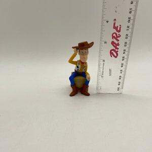 Disney Toy Story Woody Sitting on Block Figurine - Etsy