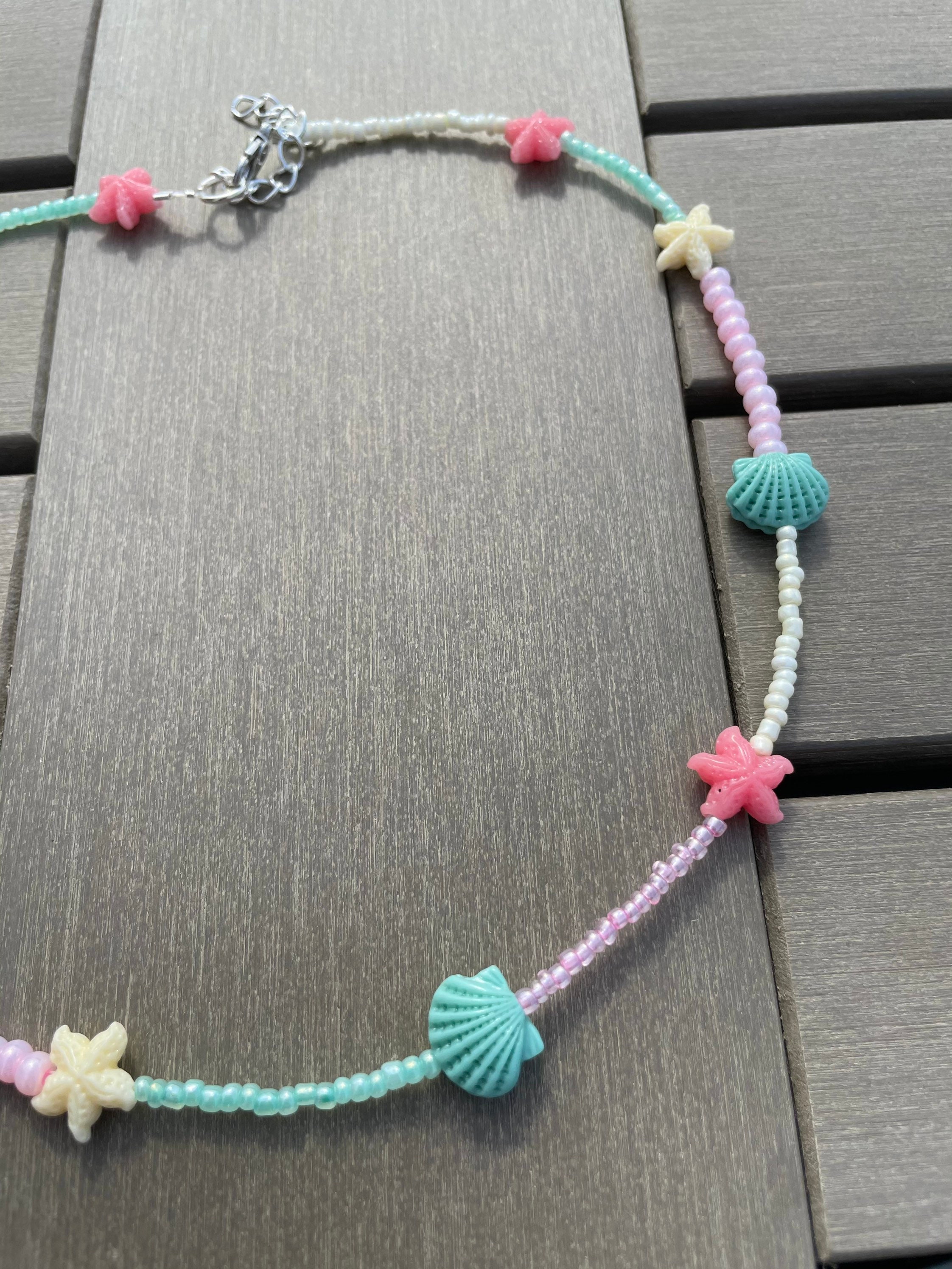 Pink, White, and Blue Starfish and Seashells With Small and Big Space ...