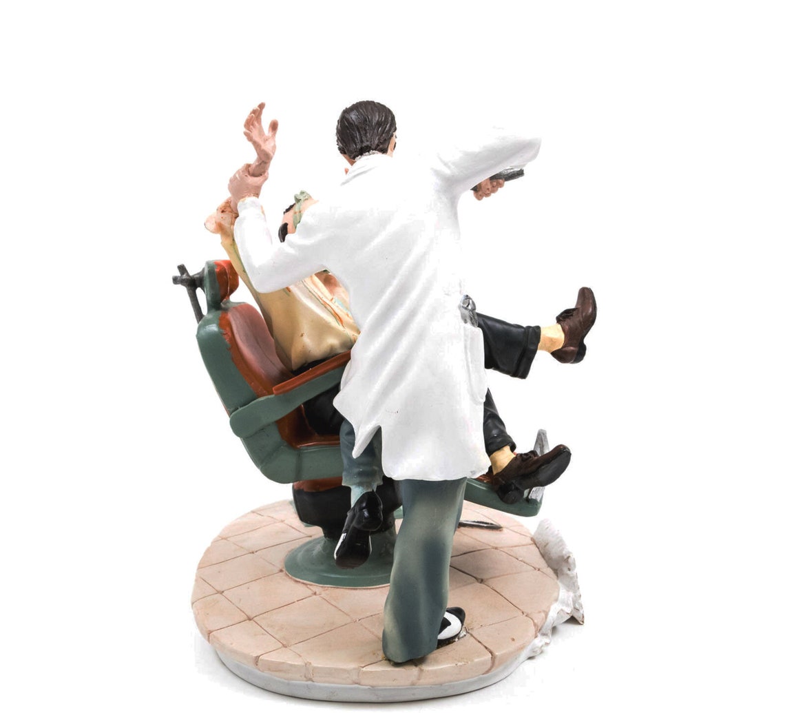 Decorative Art Figurine Statue of Male Dentist Performing an Extraction ...