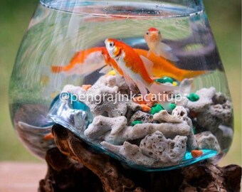 Ikan Emas Dalam Balang