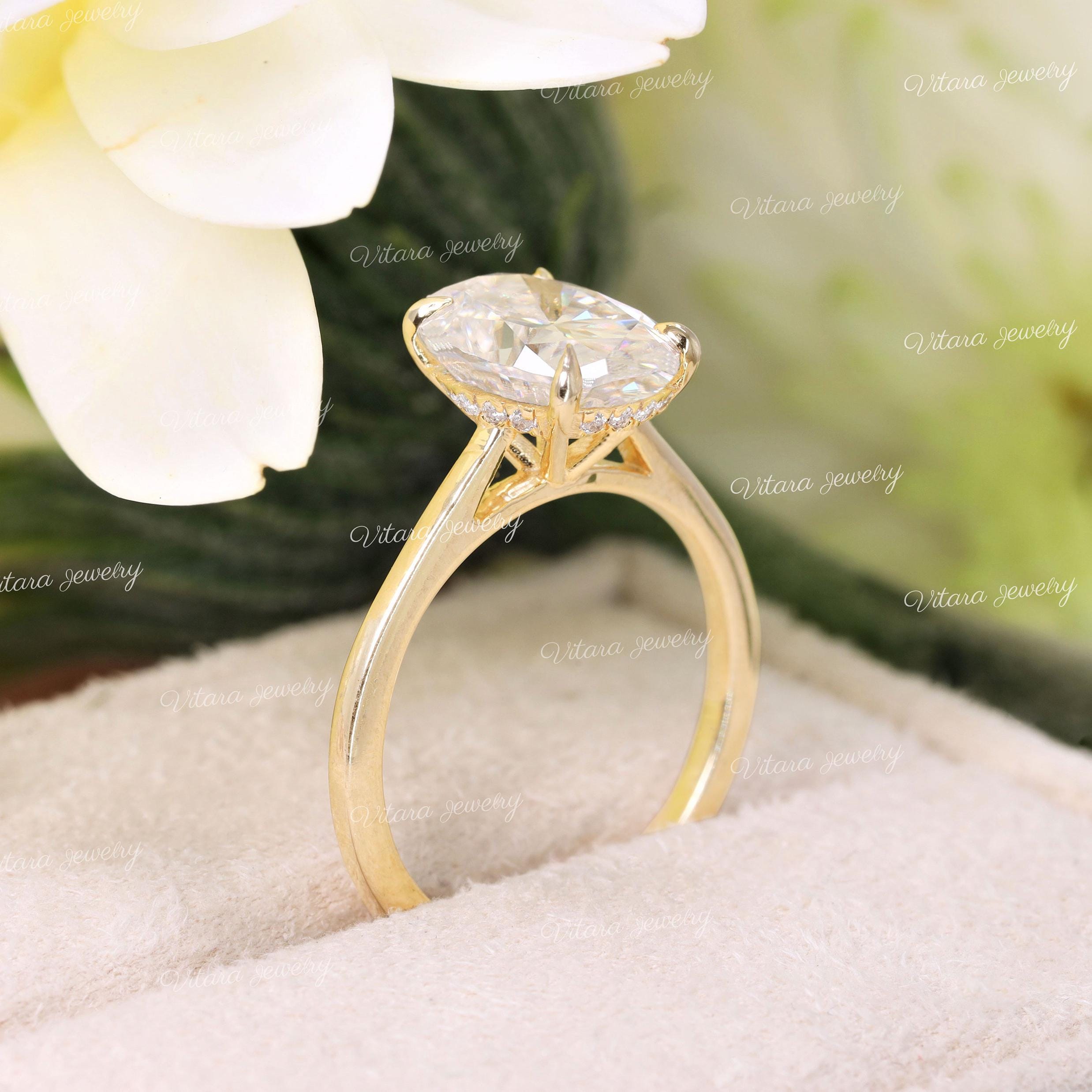 Oval cathedral engagement ring store