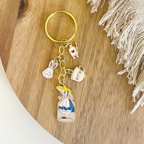 Disneys Alice in Wonderland Doorable Keychain - Etsy
