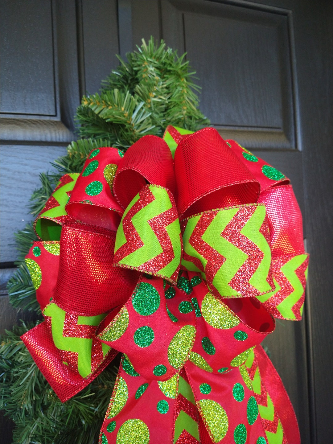 Whimsical Red and Green Christmas Colors on Wired Ribbon Tied Into A ...