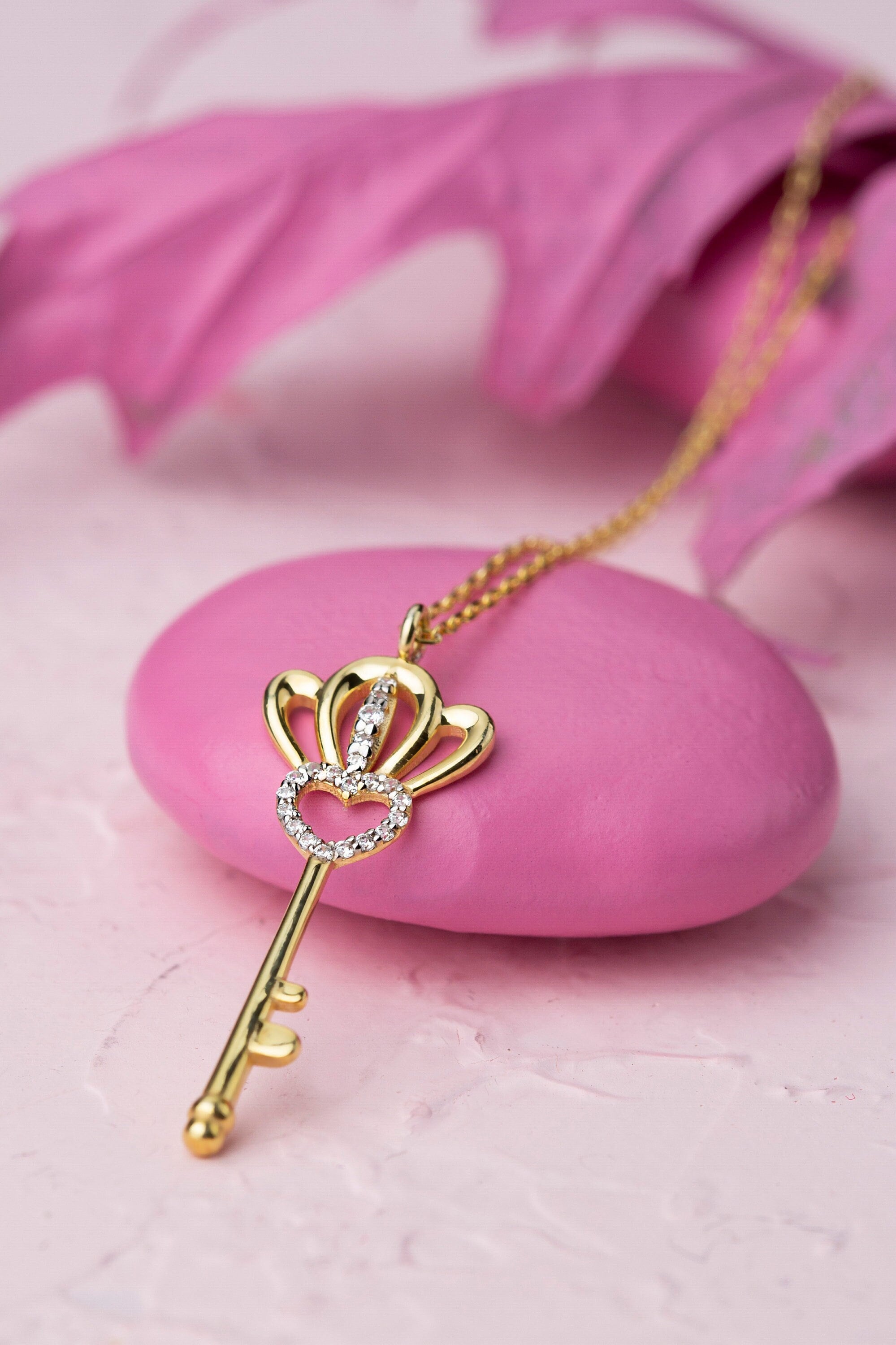 Crown key pendant store
