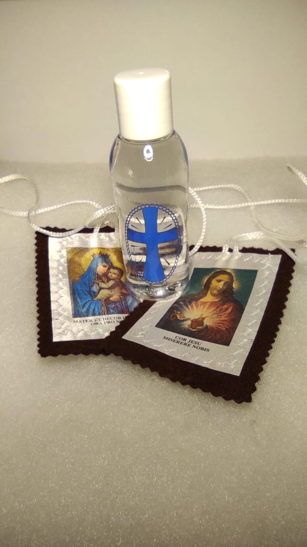 Blessed by Pope Francis, the Bottle Containing the Holy Water Comes ...