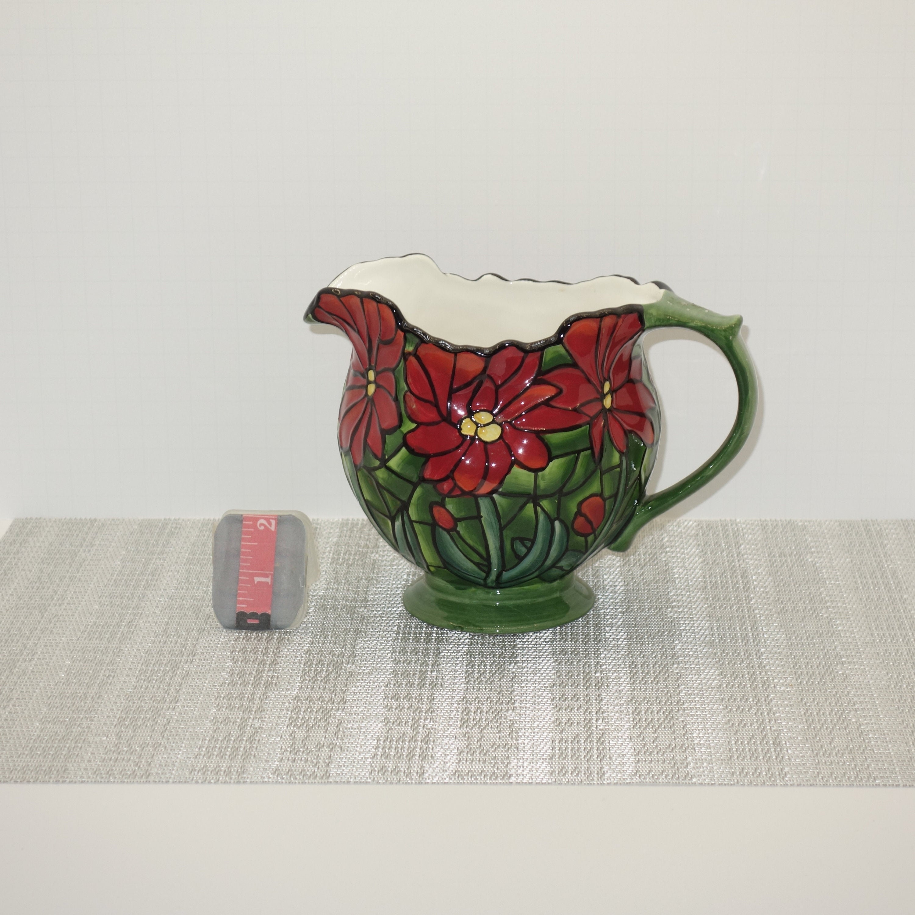 Poinsettia ceramic pitcher with a stained glass look - Etsy.de
