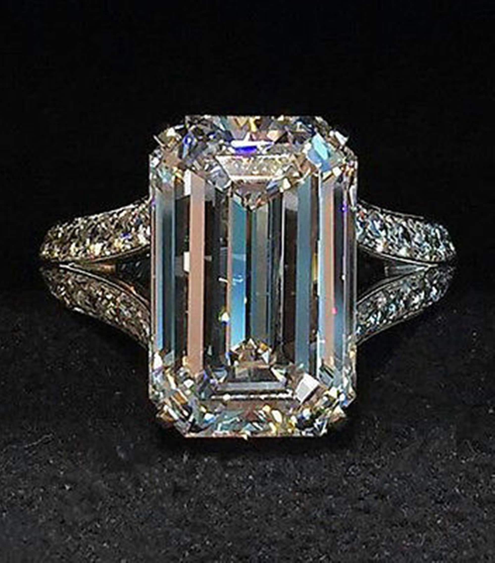 Cartier emerald cut engagement ring store
