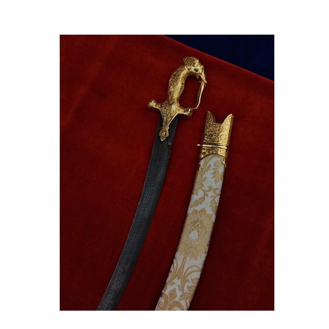 Gold Plated Elephant Face Hilt With White Textured Brocade - Etsy