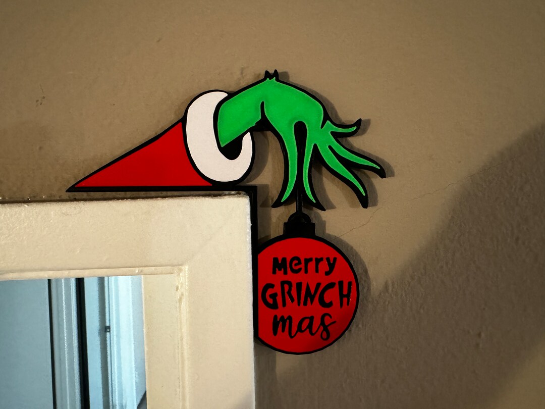 Mean Green Guy Holding Ornament Christmas Door Topper - Etsy