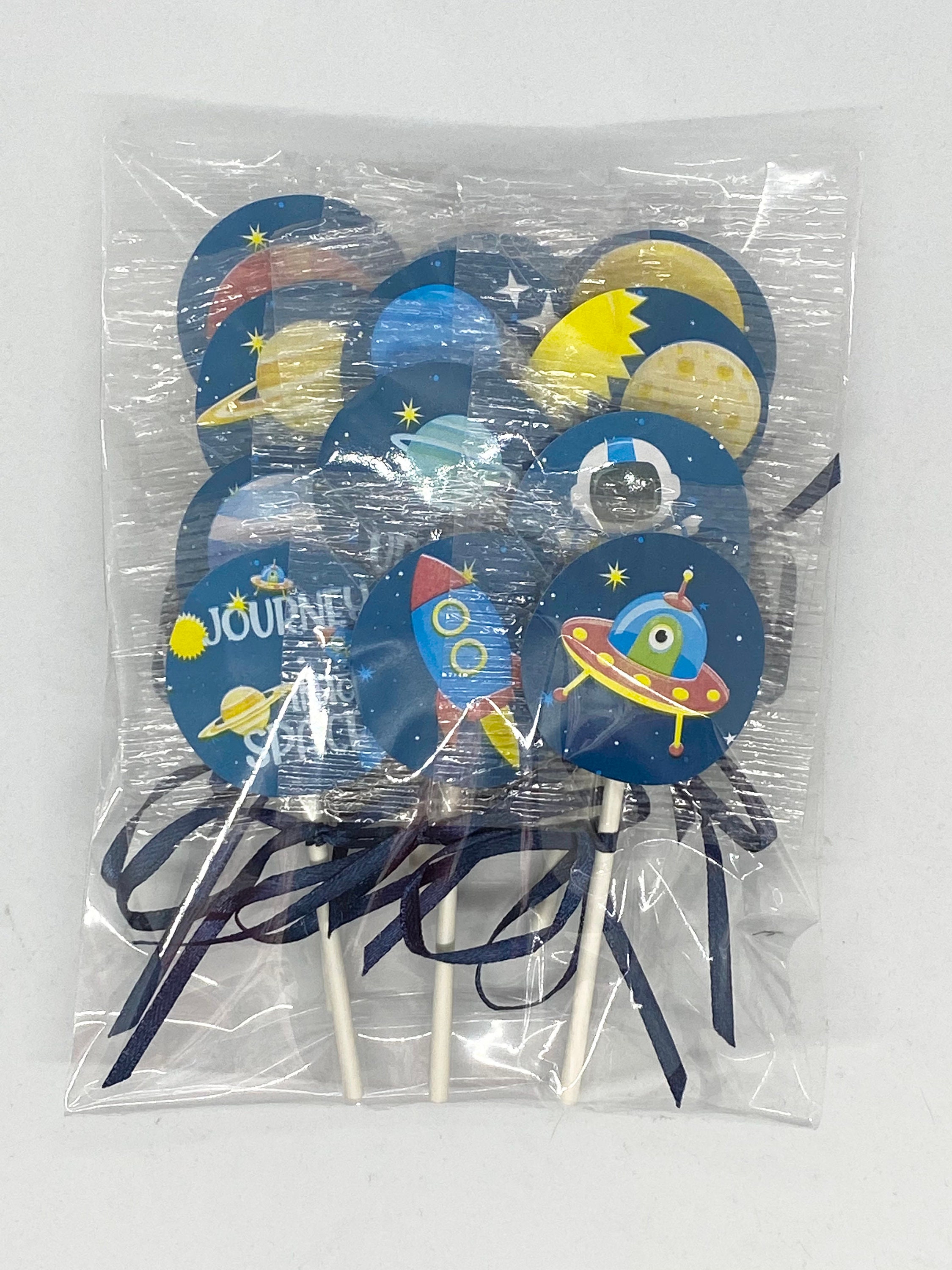 Journey Into Space Lollipops With Blue Satin Ribbon Bows Rocket ...