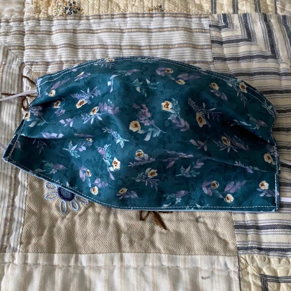 Flowers on green fabric face cover with adjustable elastic ear | Etsy