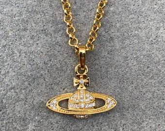 Saturn Cross Necklace - Etsy