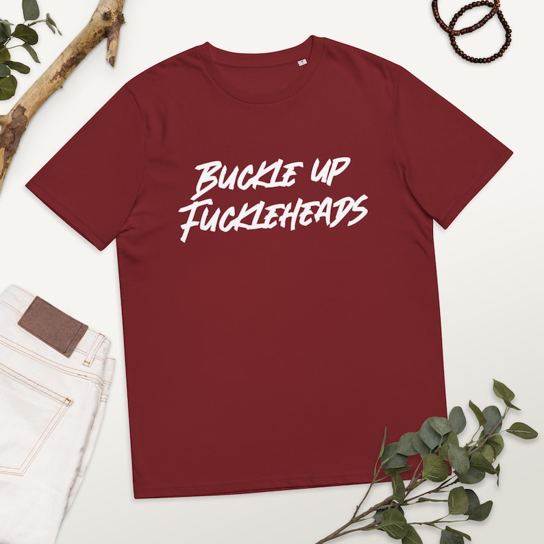Succession Merch "buckle up Fuckleheads" - Organic Cotton Unisex T-shirt 5 Colours: High-quality ...