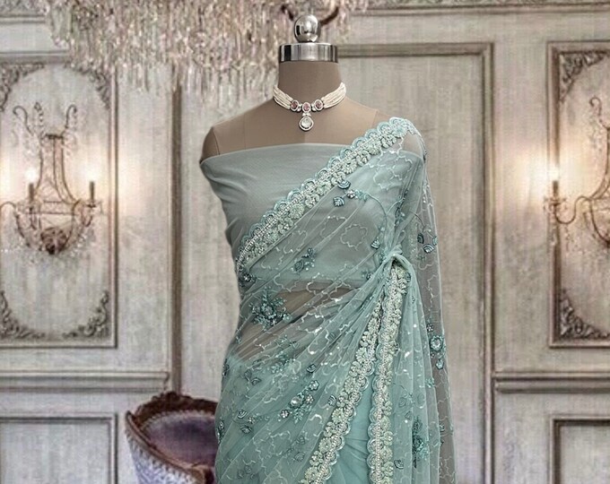 Beautiful Dull Turquoise Net Saree With Zari and Sequins Work and ...