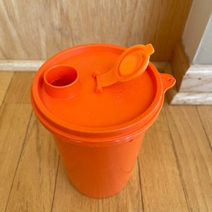Small Vintage Midcentury Modern Orange Round Juice Liquid Tupperware ...