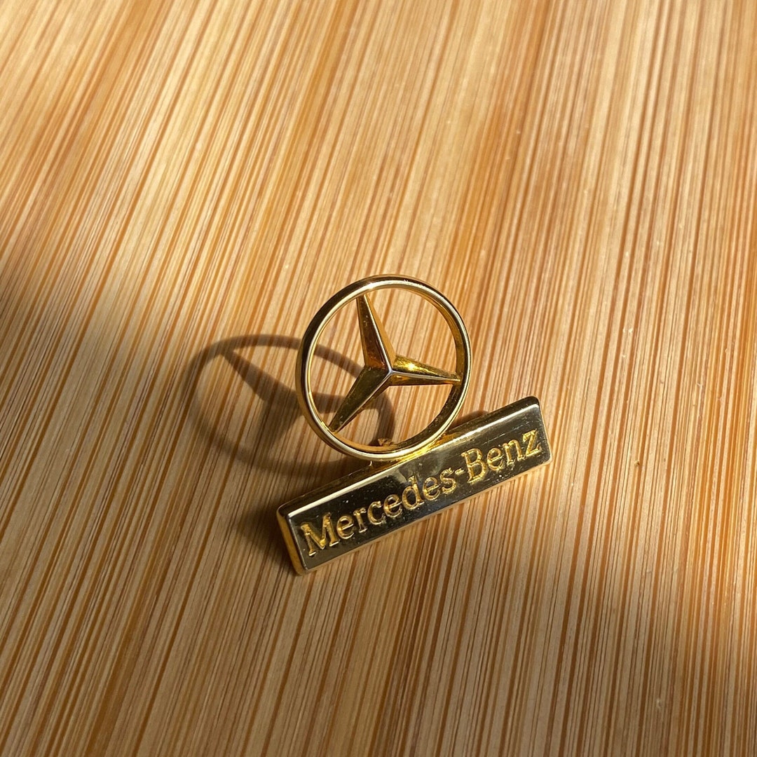 Sophisticated Shiny Gold-colored Vintage Mercedes Benz Engraved Logo ...