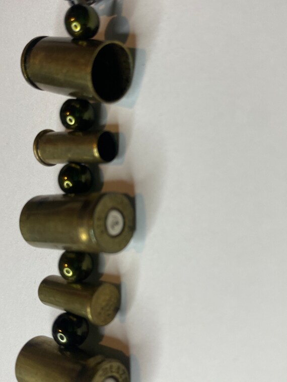 Custom bracelet made from empty bullet shell casings … - Gem