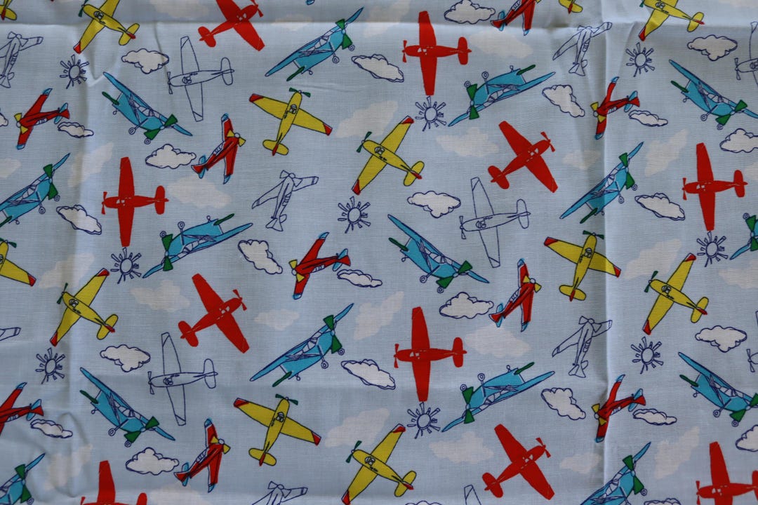 Airplane Fabric in Primary Colors on Light Blue Sky - Bright Airplane ...