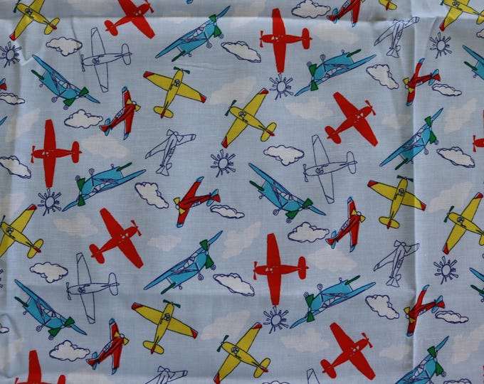 Airplane Fabric in Primary Colors on Light Blue Sky - Bright Airplane ...