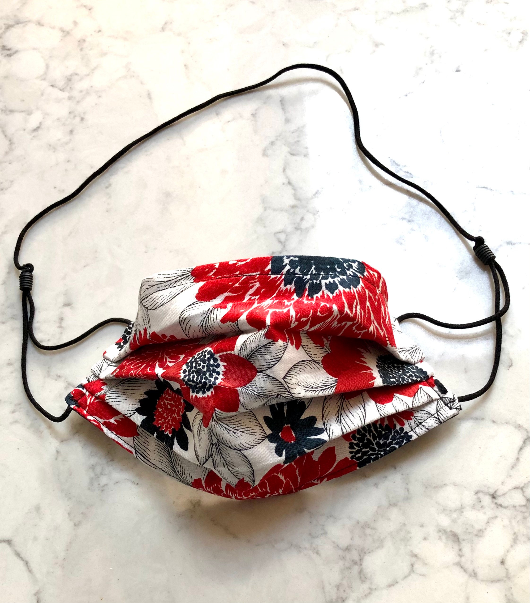 Face Mask with elastic neck strap, adjustable elastic ear loops and a ...