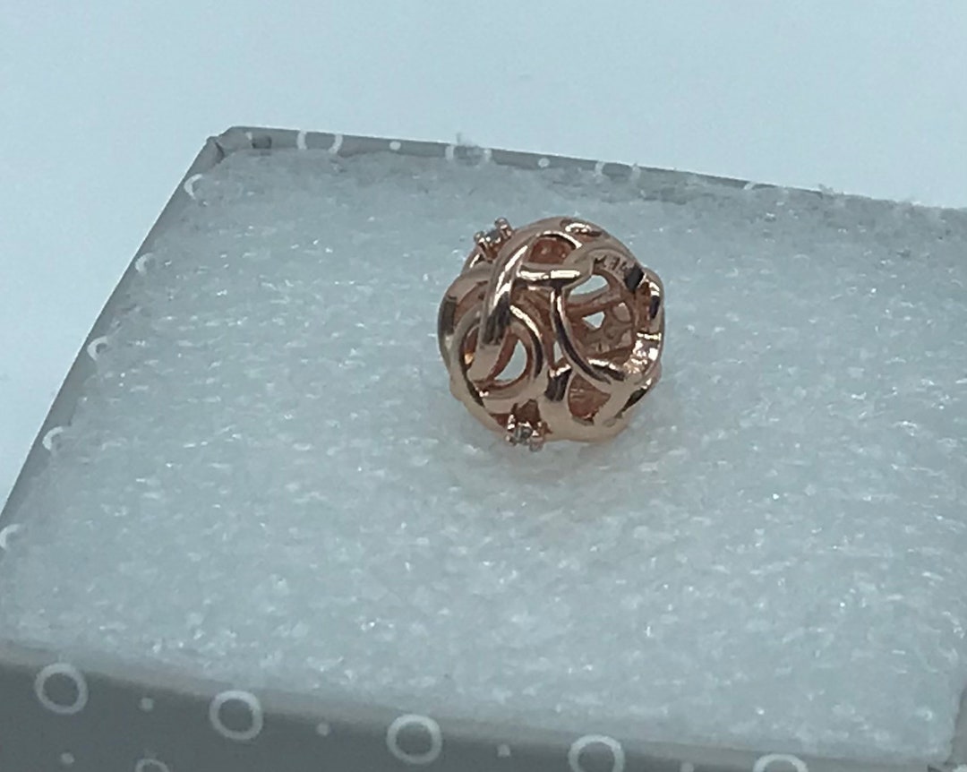 Pandora Rose™, Openwork Woven Infinity Charm 14K Gold Plated 788824C01 ...