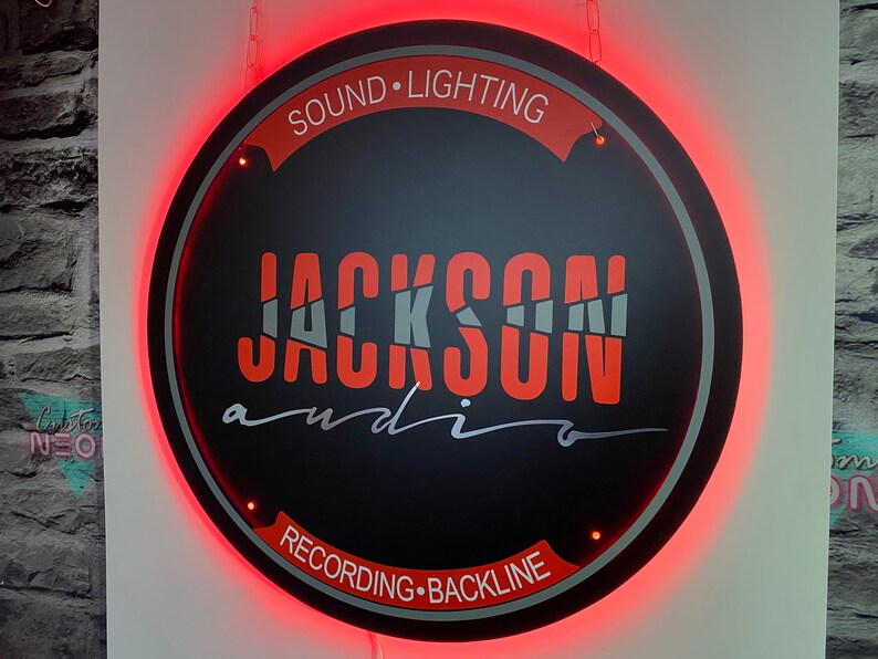 Black Acrylic Badge With Logo. Signboard With LED Backlight. Business ...