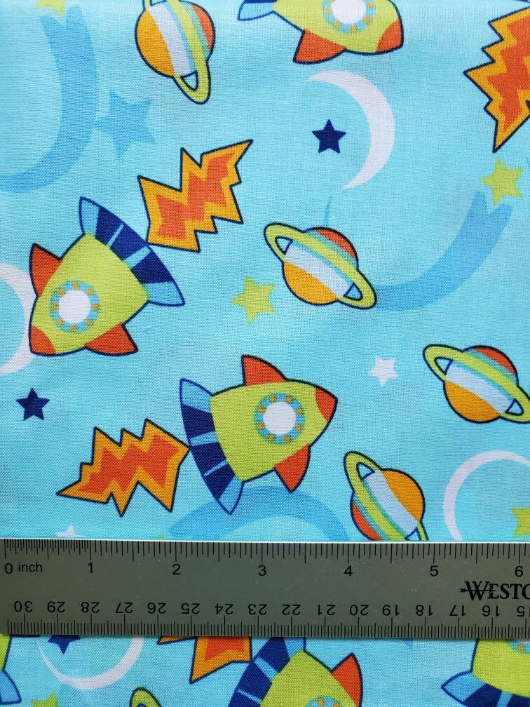 Rockets, Cotton Fabric, by Jo-ann Fabrics. Flaming Rockets, Planets ...