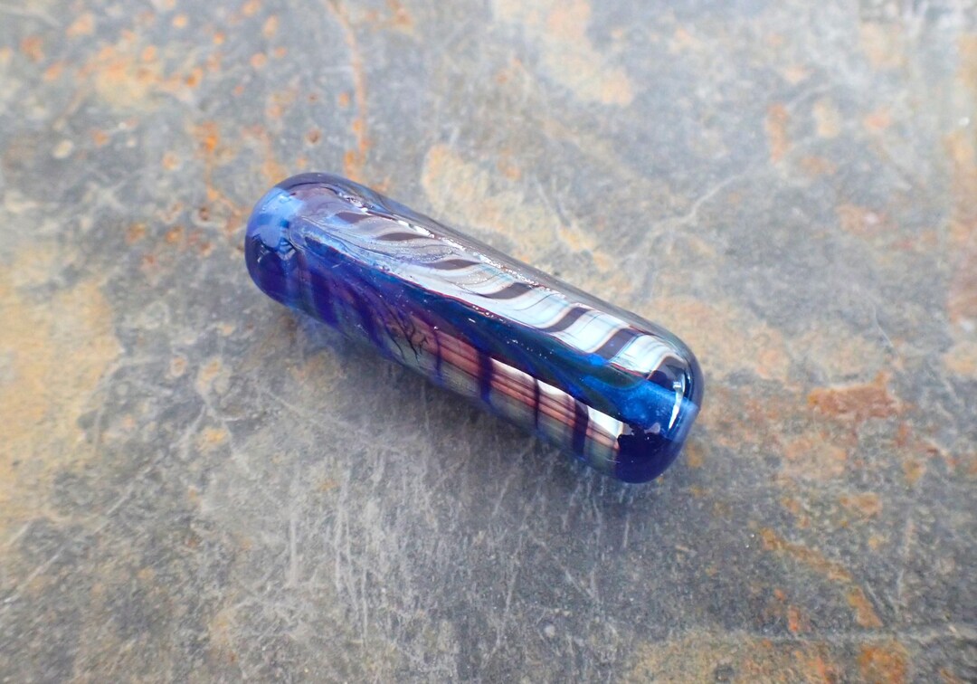 A Focal Tube Bead Medium Clear Blue Transparent With Shiny Blue Ribbons ...