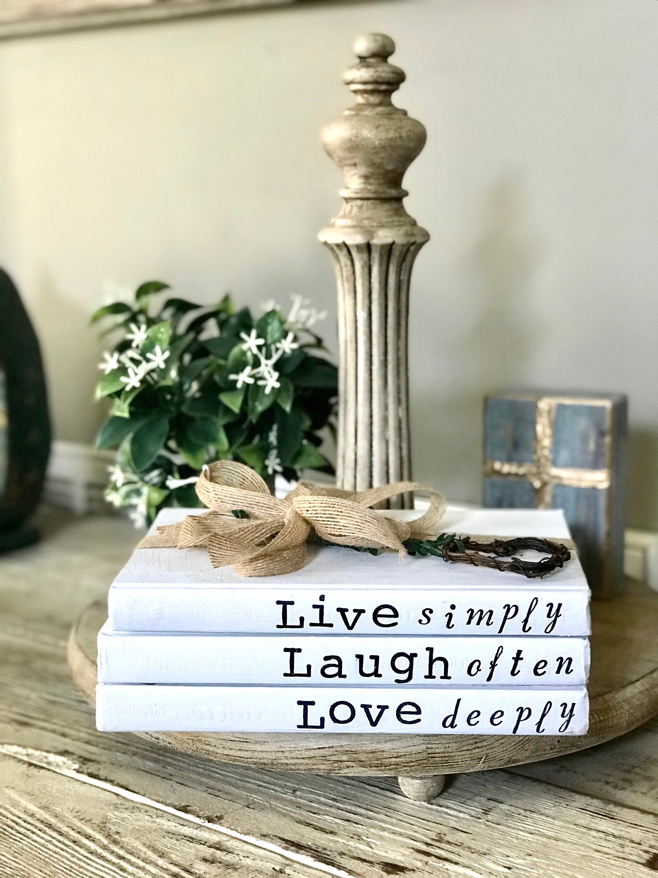 Live Simply. Laugh Often. Love Deeply. Stamped Book Stacks ...