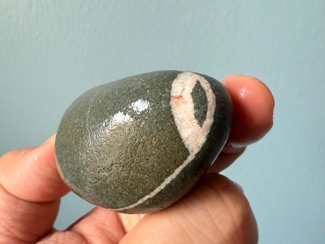 A Huge Green Celtic Wishing Stone With Multiple Big White Circles ...