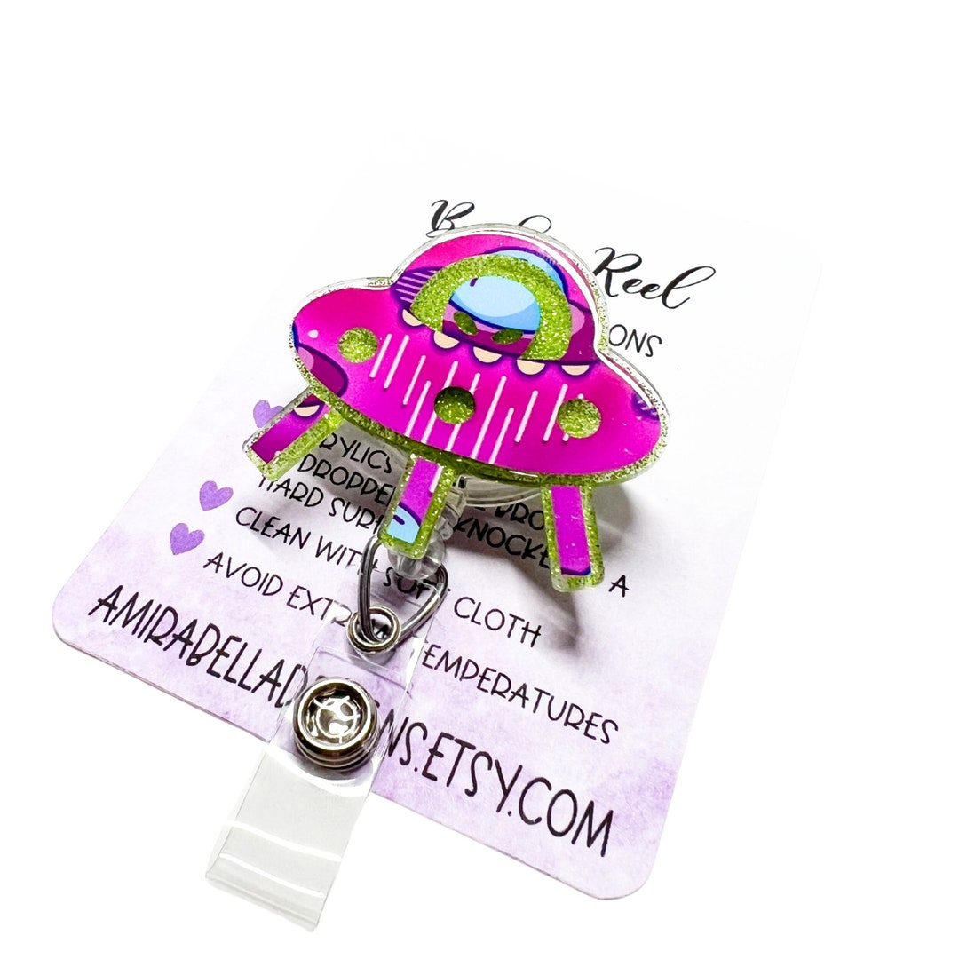 Glow in the Dark Alien Spaceship Badge Reel. UFO Alien Cow Abduction ...