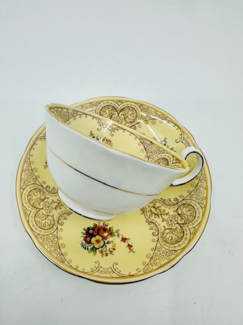 Aynsley Cream Coloured Floral Teacup and Saucer - Etsy